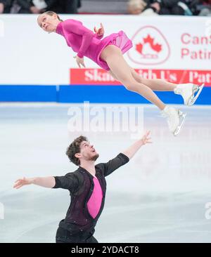 Ioulia Chtchetinina and Michal Wozniak of Poland perform in the pairs ...