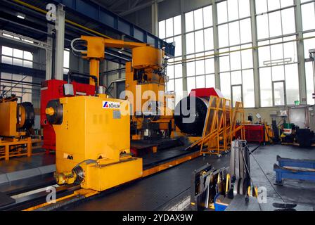 working and producing in a plant in the iron industry working in the ...