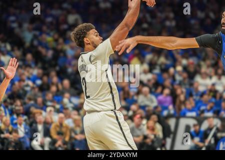 Brooklyn Nets forward Cameron Johnson (2) holds the ball away from Oklahoma City Thunder guard ...