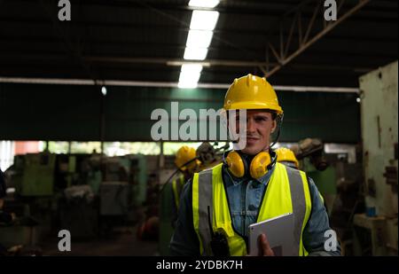 Chief mechanical engineer working in a mechanical factory Stock Photo ...