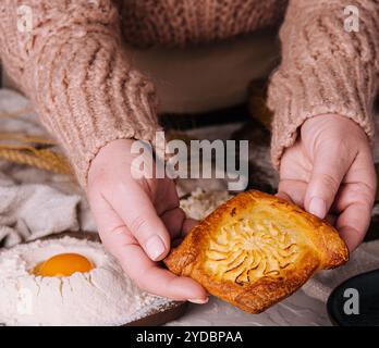 Cottage cheese pastry pies in grandmas arms Stock Photo - Alamy
