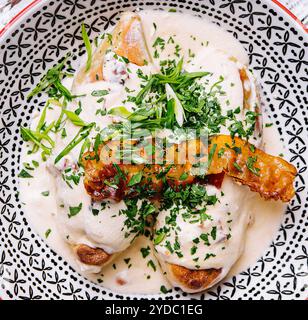 The national dish of Lithuania - potato dumplings, zepelins with greens ...