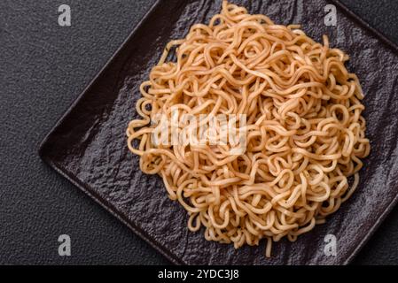 Asian dish rice noodles with salt and spices Stock Photo - Alamy