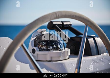 Sailing yacht control wheel and implement Stock Photo - Alamy