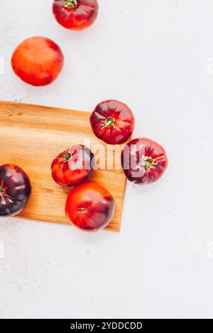 Tomatoes Mar Azul on white wooden table background Stock Photo - Alamy