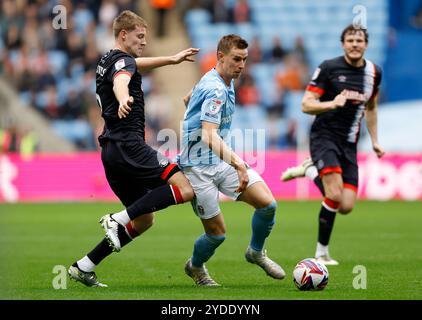 Luton Town's Mark McGuinness (centre) concede’s an own goal during the ...