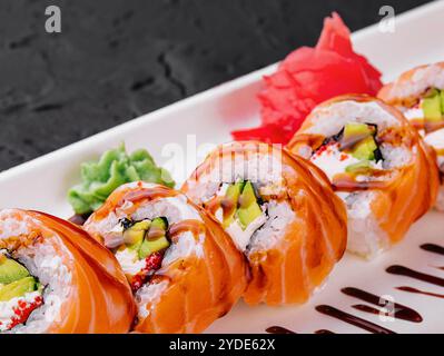 Classic roll philadelphia on black slate plate Stock Photo - Alamy