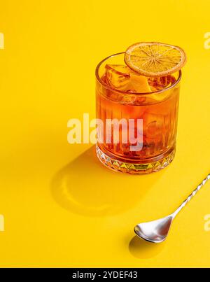 Food, Cocktail Negroni on yellow background Stock Photo - Alamy