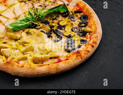 Four varieties of pizza top view Stock Photo - Alamy