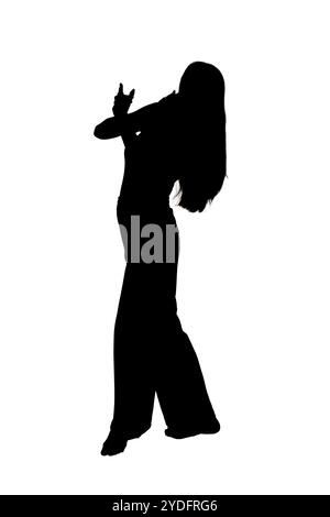 A graceful silhouette of a woman dancing elegantly against a pure white ...