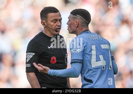 Phil Foden of Manchester City appeals for a penalty as he goes down ...