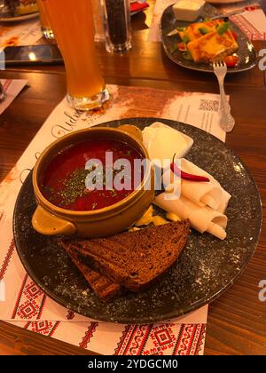 traditional Ukrainian borscht in a brown clay dish Stock Photo - Alamy
