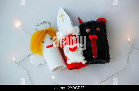 Saint Nicholas, Angel and Devil made by a child from toilet paper roll ...