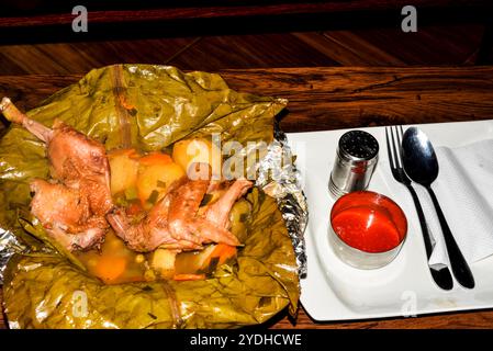 Chicken luwombo meal. The Luwombo is a Ugandan traditional cuisine ...
