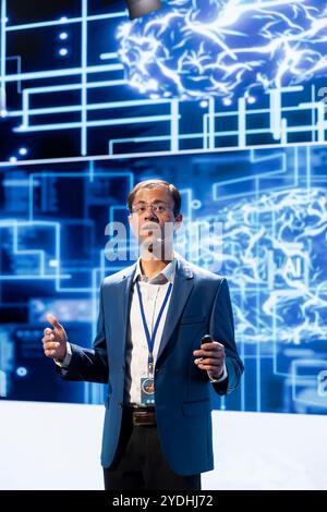 Computer scientist using AR technology to visualize script, writing code on computer screen ...