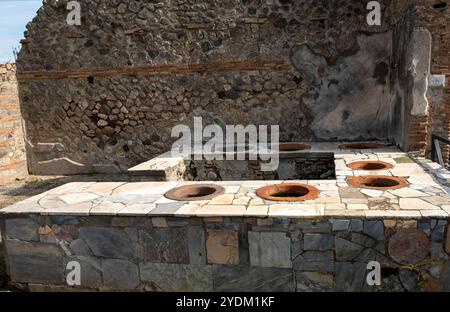 Cooking pots in a Roman kitchen, Archaeological Park of Pompeii, Naples ...