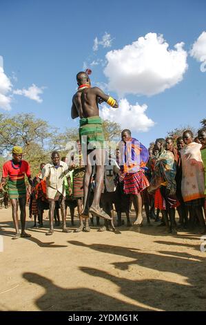Karimojong yout performing Edong, a a traditional Karimojong dance in Kaabong, Karamoja Uganda ...