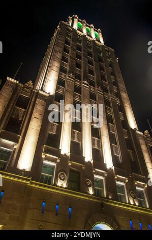 the landmark finance ministry building illuminated at night in Quebec ...