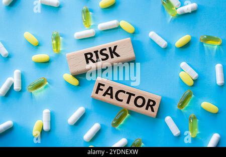 Risk Factor symbol. Concept word Risk Factor on wooden blocks ...