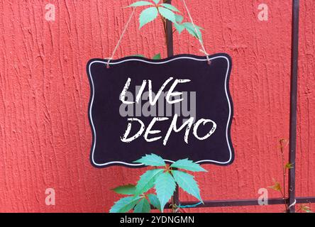 Live demo symbol. Concept words Live demo on beautiful black house ...