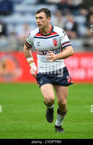WIGAN, ENGLAND - October 3: Harry Smith of Wigan Warriors shakes hands ...