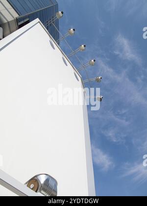 Spotlights on advertising billboards Stock Photo - Alamy