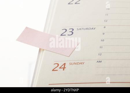 Schedule book with sticky notes Stock Photo - Alamy