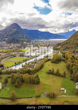 Top aerial view of villages in Switzerland mountains at summer time ...