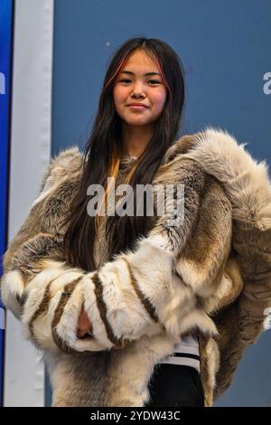 Inuit, girl in traditional dress, bench, Eskimo, Iceland, Canada Stock ...