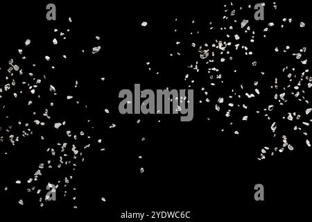 split debris caused by explosion against black background Stock Photo ...