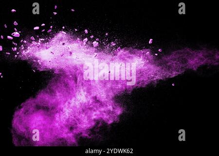 Split debris of stone exploding against black background Stock Photo ...