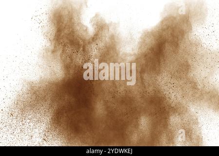 Brown powder explosion on white background Stock Photo - Alamy