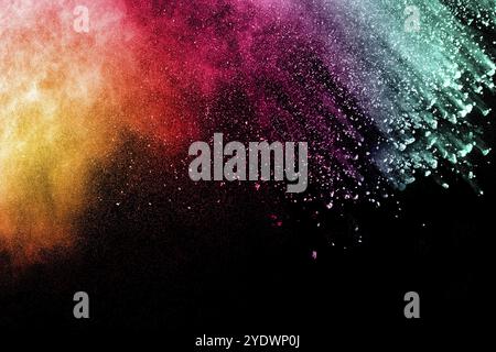 Abstract multicolored dust explosion on black background. Abstract ...