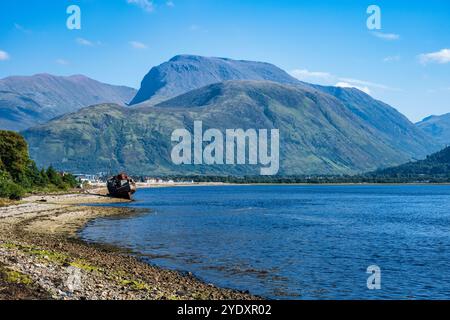 Corpach shipwreck on shingle beach of Loch Linnhe at village of Caol ...