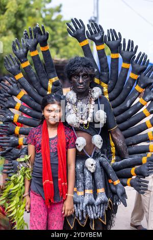 Kulasai, Portrait of indian hindu devotee with painted face and dressed ...