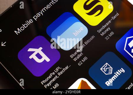 In this photo illustration Bitcoin logo is displayed on a smartphone ...