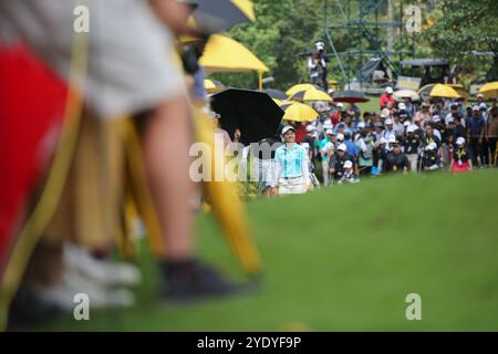 Jeeno Thitikul, of Thailand, walks on the 10th green during a practice ...
