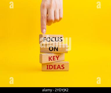 Focus on Key Ideas symbol. Concept words Focus on Key Ideas on wooden ...