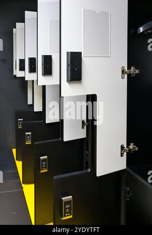 Open lockers for clothes with electronic lock Stock Photo - Alamy