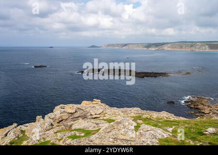 The sea and the cliff rocks, with The Brisons in the distance, at Cot ...