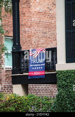 A Trump-Vance campaign poster is displayed next to rural mailboxes near ...