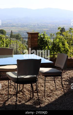 a dining table on a luxury terrace overlooking the Mediterranean ...