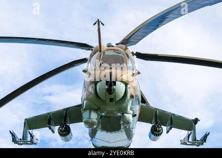 Camouflaged Soviet Mi-24 attack helicopter from below Stock Photo - Alamy
