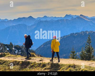 Tourists hiking on Fuessener Joechle mountain in Haldensee, Tyrol ...
