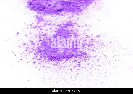 Pile of violet powder isolated on white background Stock Photo - Alamy