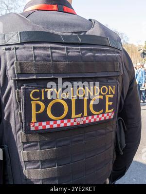 A City Of London Police Officer Monitoring Traffic In The City Of ...