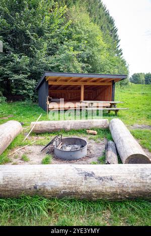 typical danish rustic Campsite With Wooden Shelter and Fire Pit Stock ...