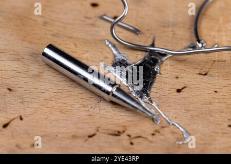 thin solder and soldering iron tips, twisted solder for repair work ...
