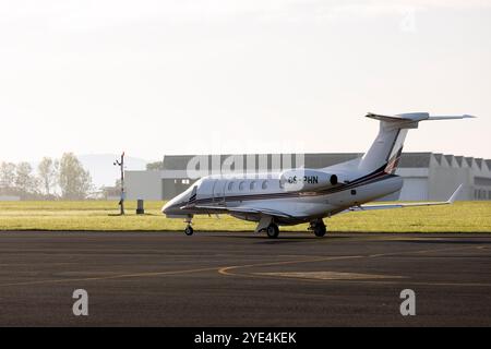 NetJets Embraer Phenom 300 leaving Biarritz Airport Stock Photo - Alamy