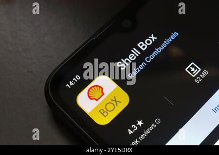 In this photo illustration, the logo of Shell is displayed on the ...